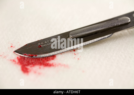 surgical instruments set for an operation with blood on them Stock ...