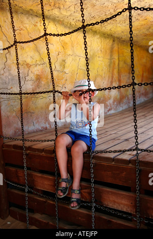 kids play in cave on playground, Children playing in cave Stock Photo ...