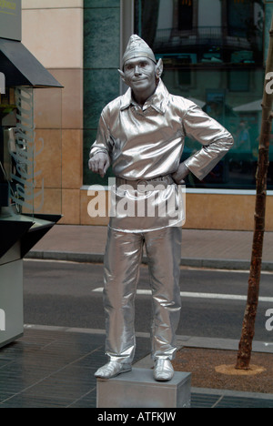 Alien live statue, street performer posing on La Rambla in Barcelona ...