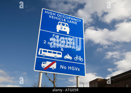Road signs for High occupancy vehicle lane and pedestrian crossing ...