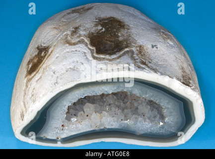 Opened agate bearing rock showing colourful banding and internal ...