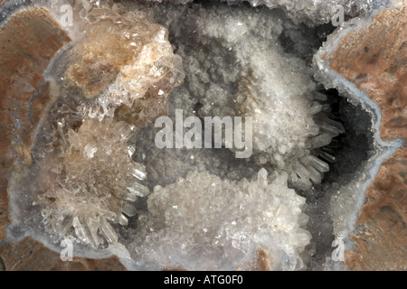 Opened agate bearing rock showing colourful banding and internal ...