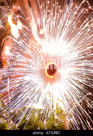 Catherine wheel firework spinning Stock Photo - Alamy