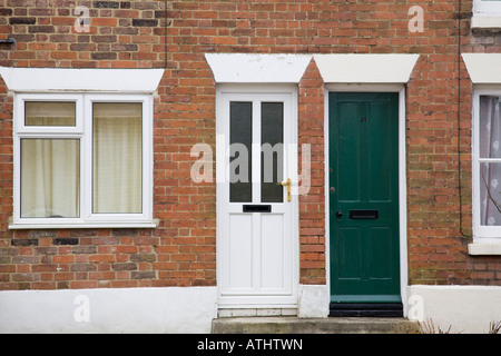 Victorian terraced houses one with uPVC replacement window showing ...