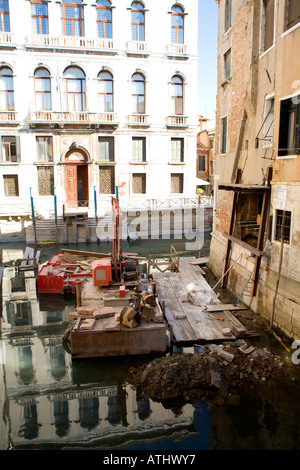 ITALY Veneto Venice In Peril Canal houses with crumbling plaster and ...