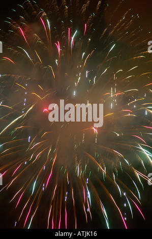 Pink fireworks mid air explosion Stock Photo - Alamy