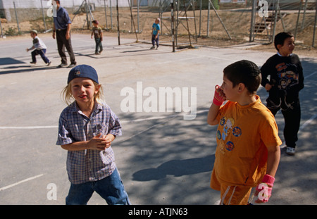 Jewish children playing football in Yericho settlement Stock Photo - Alamy