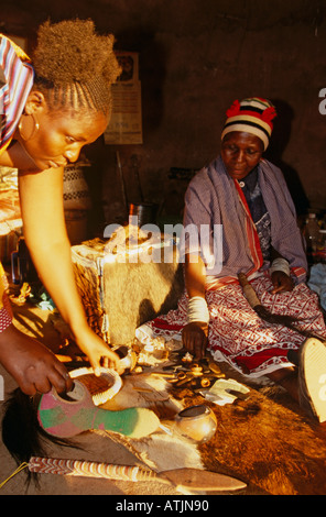 Sangoma (traditional healer) sitting in front of house, Lesotho, Africa Stock Photo - Alamy