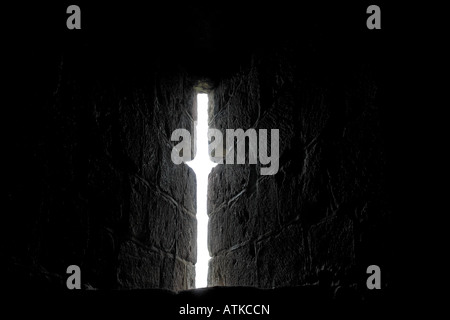 Inside a medieval castle arrow slit in the historic wall of Old ...