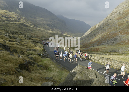 Runners in the 2004 Snowdon marathon complete the climb up from ...