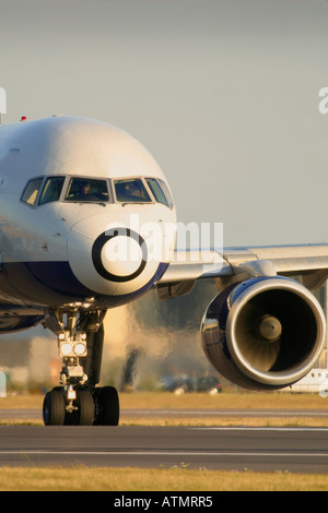 A close up Nose of the Boeing 757 with Pilots at the controls at ...