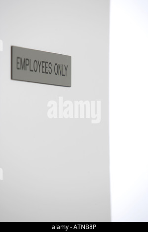 Employess Only Sign in a hallway Stock Photo - Alamy