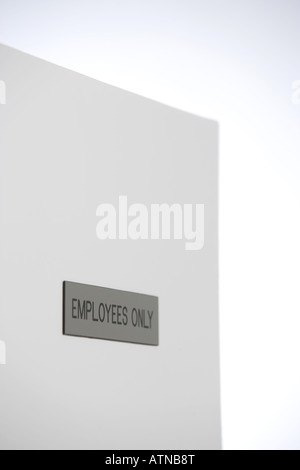 Employees Only Sign in a hallway Stock Photo - Alamy