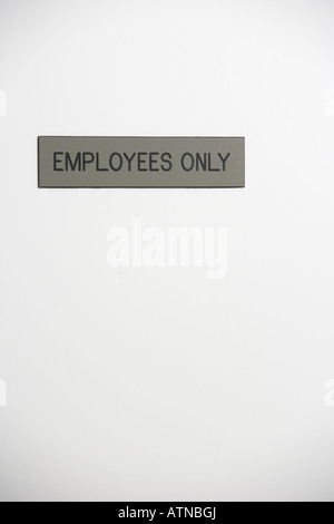 Employess Only Sign in a hallway Stock Photo - Alamy