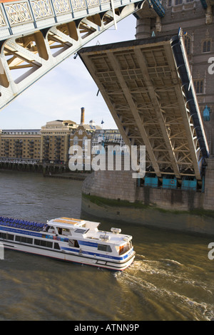 Cantilevered bridge. Boat passing under a steel cantilevered bridge in ...