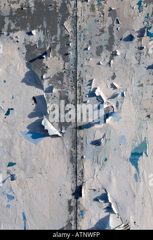 Torn billboard posters Stock Photo - Alamy