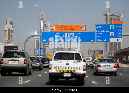 Road signs and traffic on Sheikh Mohammed Bin Zayed Road E311, Dubai ...