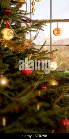 close-up view of christmas tree decorated with beautiful shiny colorful ...