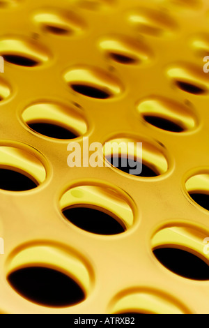plastic background with holes Stock Photo - Alamy