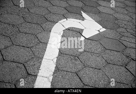 Parking lot directional arrow. (traffic flow arrow Stock Photo ...