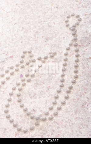 Long strand of pearls Stock Photo - Alamy
