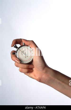 Stopwatch in hand isolated on white, close up Stock Photo - Alamy