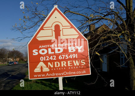 House sold sign Andrews Estate Agents Cotswolds UK Stock Photo - Alamy