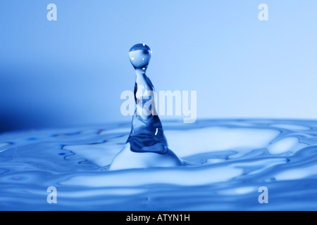 water droplet rebounding on the surface Stock Photo - Alamy