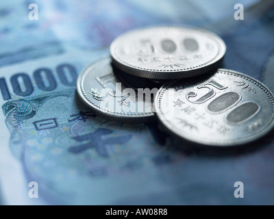 Japanese yen banknotes and coins Stock Photo - Alamy
