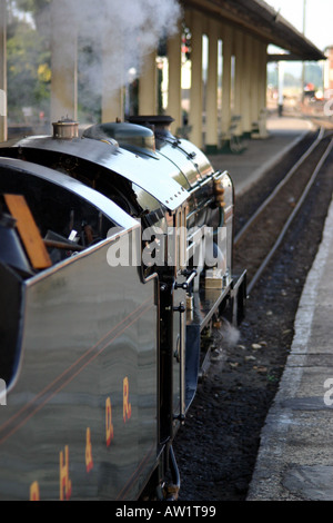 A train at the platform at New Romney station on the Romney, Hythe ...