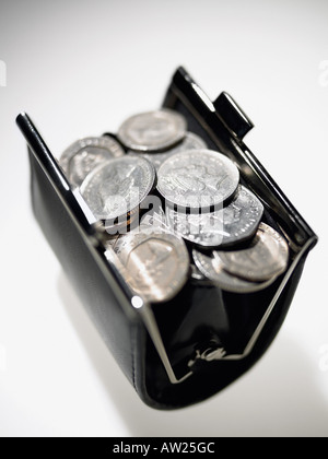 Purse full of money Stock Photo - Alamy