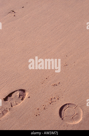 Circle shape imprint in sand surface. A closed curve, a ring or a disc ...