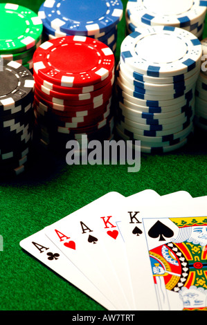 Stacks of poker chips and Ace and King on wooden background, poker ...