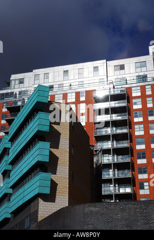 Brightly lit tower against blue sky backdrop at Al Ghariyah Resort ...