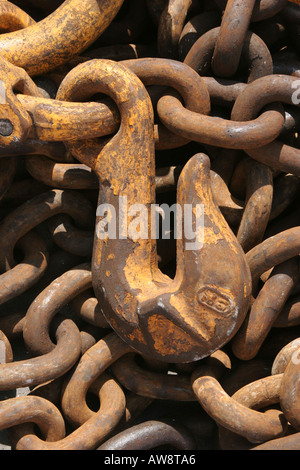 Long rusty chains with crane hook as industrial background Stock Photo ...