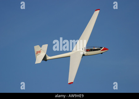 A modern Puchacz training glider turning before landing Stock Photo - Alamy