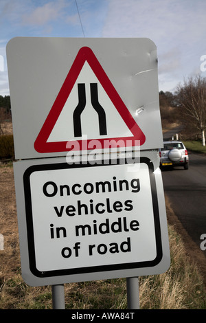 UK Road Sign 'warning oncoming vehicles in middle of road' Stock Photo ...