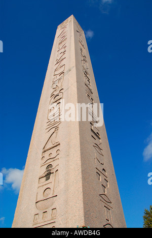 A low angle shot of obelisk with hieroglyphs, inscriptions and drawings ...