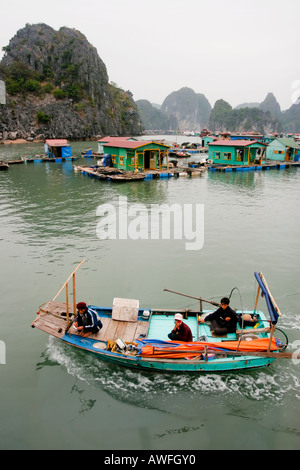 The floating villages in the Ha Long Bay of Vietnam Stock Photo - Alamy
