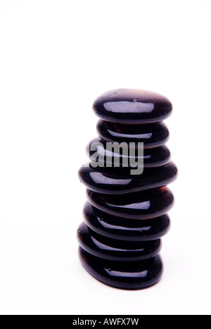 Smooth stones stacked with black background - Stacked pebbles and free ...