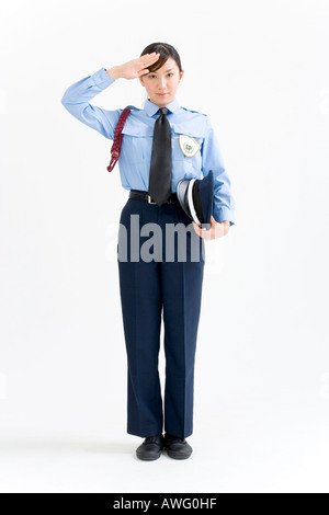 A female security guard saluting Stock Photo - Alamy