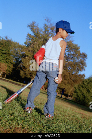 Asian boy with broken arm who wants to play baseball Stock Photo - Alamy