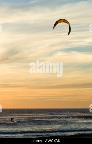 A male kite surfing at sunset C Street Ventura California USA Stock ...