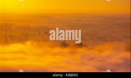 Brockham village church spire through fog mist early morning, from "Box ...