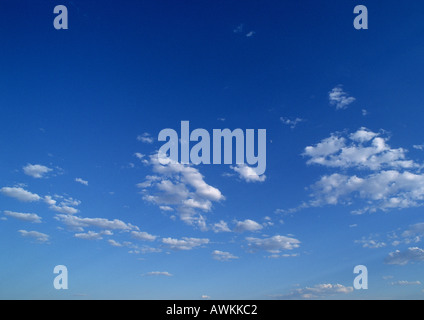 Sparse clouds in the blue sky morning background. Fluffy clouds in the ...