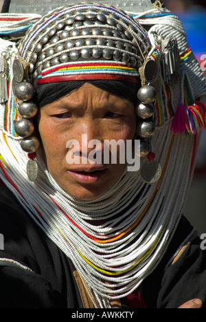 Ethnic Akha woman in tribal village near Phongsali, Laos Stock Photo ...