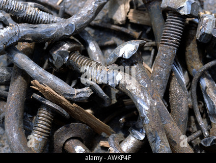 A pile of rusty nails and screws. The pile is full of different sizes ...