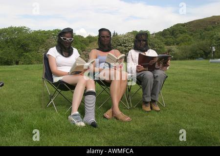3 women wearing midge nets to protect them from midges Scotland Stock ...