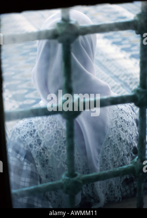 Rear view of woman standing against mountain Stock Photo - Alamy