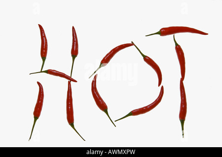 Red chili peppers spell out words relating to their taste Stock Photo ...